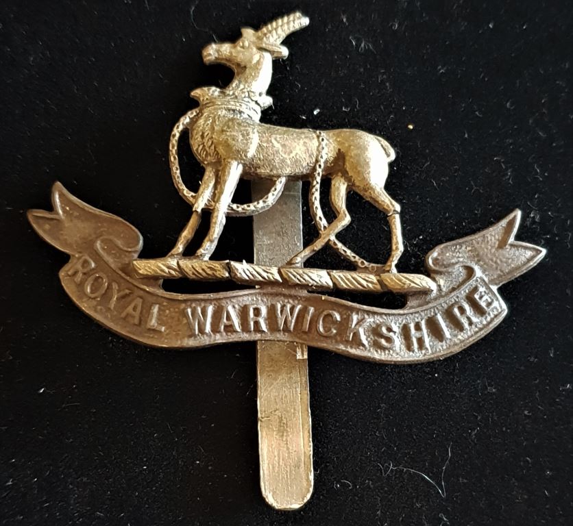 THE ROYAL WARWICKSHIRE REGIMENT CAP BADGE – John Burridge Military Antiques